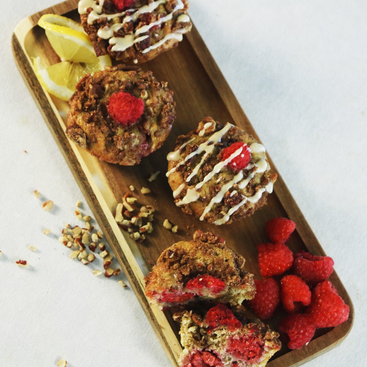 Banana Raspberry Muffins with Pecan Streusel - Groove Grub